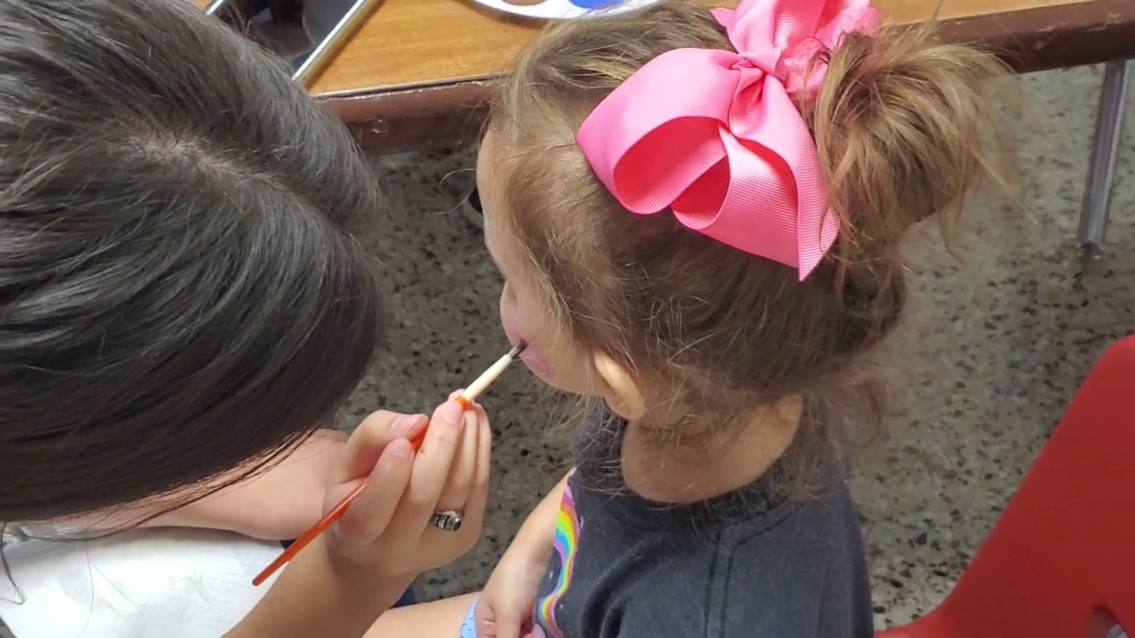 Face Painting at a school carnival - YouTube