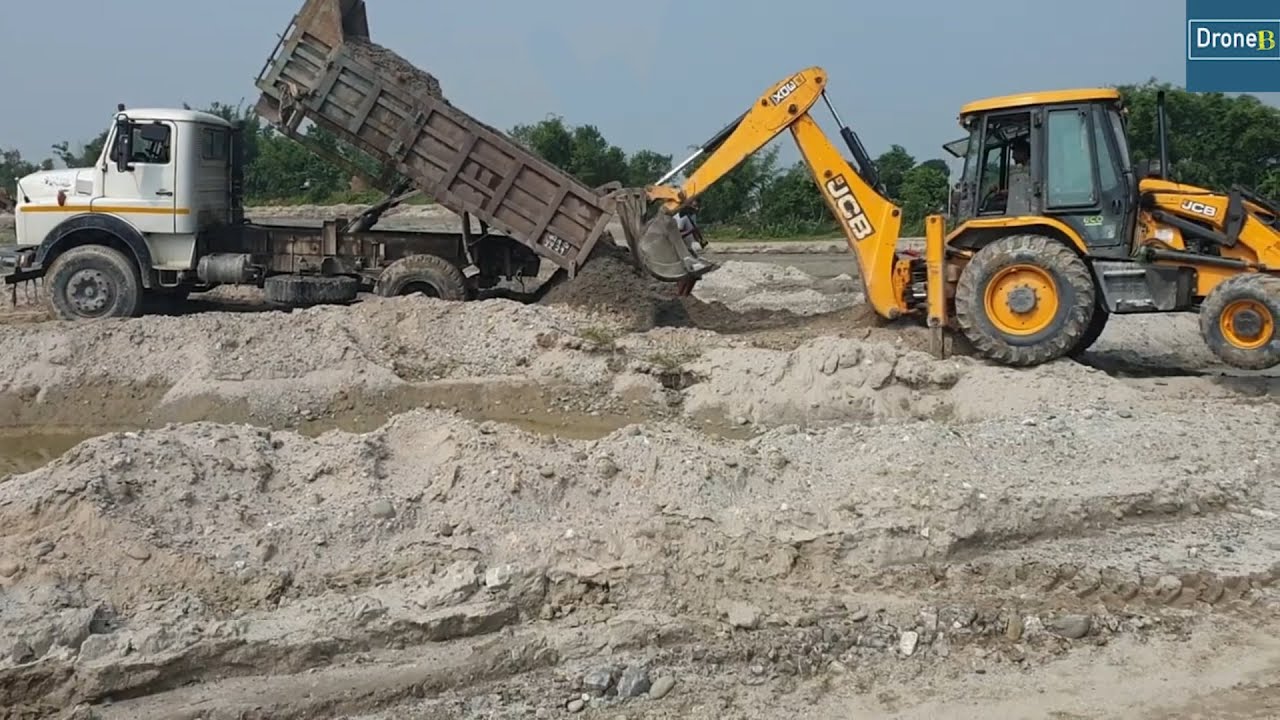 JCB Backhoe-Rescued Loaded-Stuck Dump Truck-JCB Video - YouTube