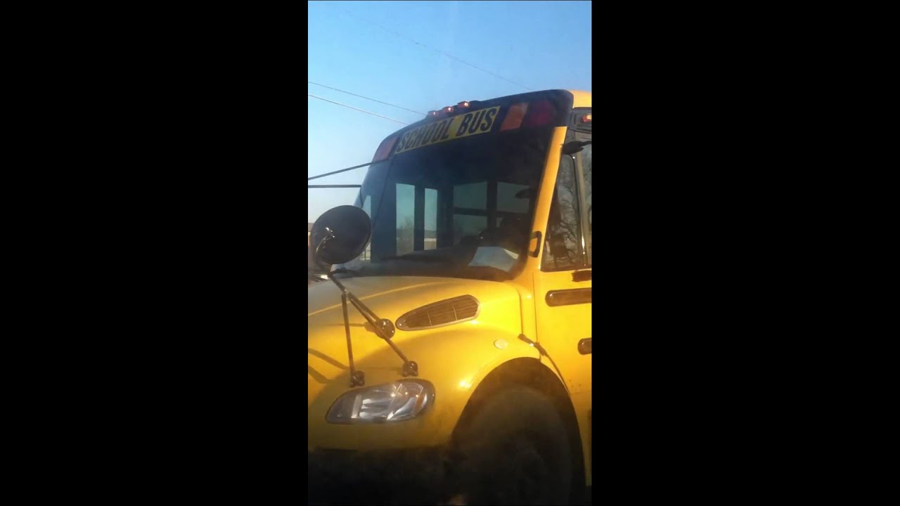 WWE's Undertaker driving a school bus. - YouTube