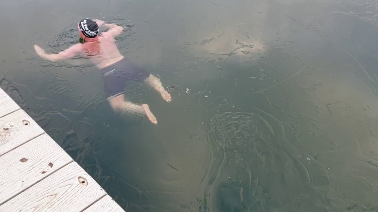 Ice play - swimming under thin ice - YouTube