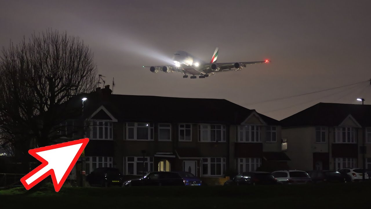 Airbus A380 landing at night time by flying low over houses - YouTube