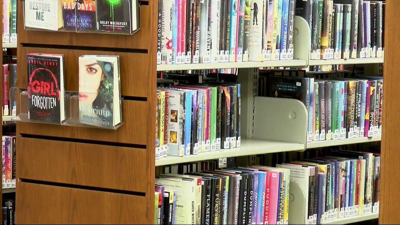 Urbana Free Library unveils two new library card designs - YouTube