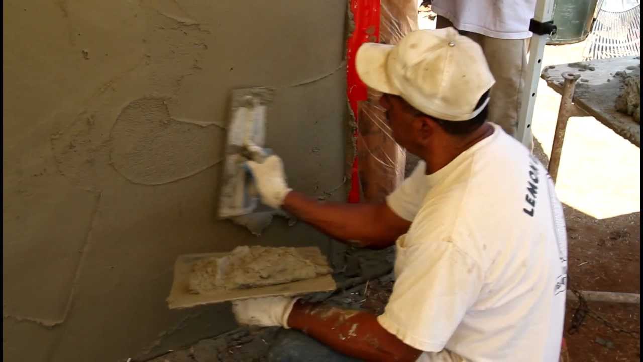 Finishing the first coat of Stucco - YouTube