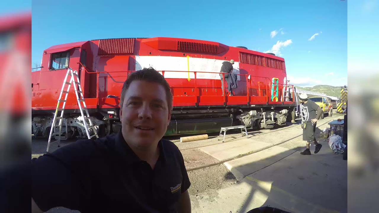 ThumbPrint wrapped a train for Loctite! - YouTube