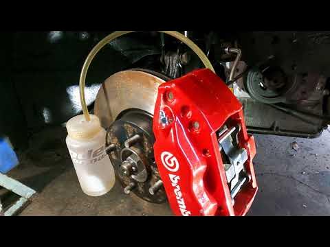 Bleeding the Brembo brakes using a Motive Power Bleeder. - YouTube