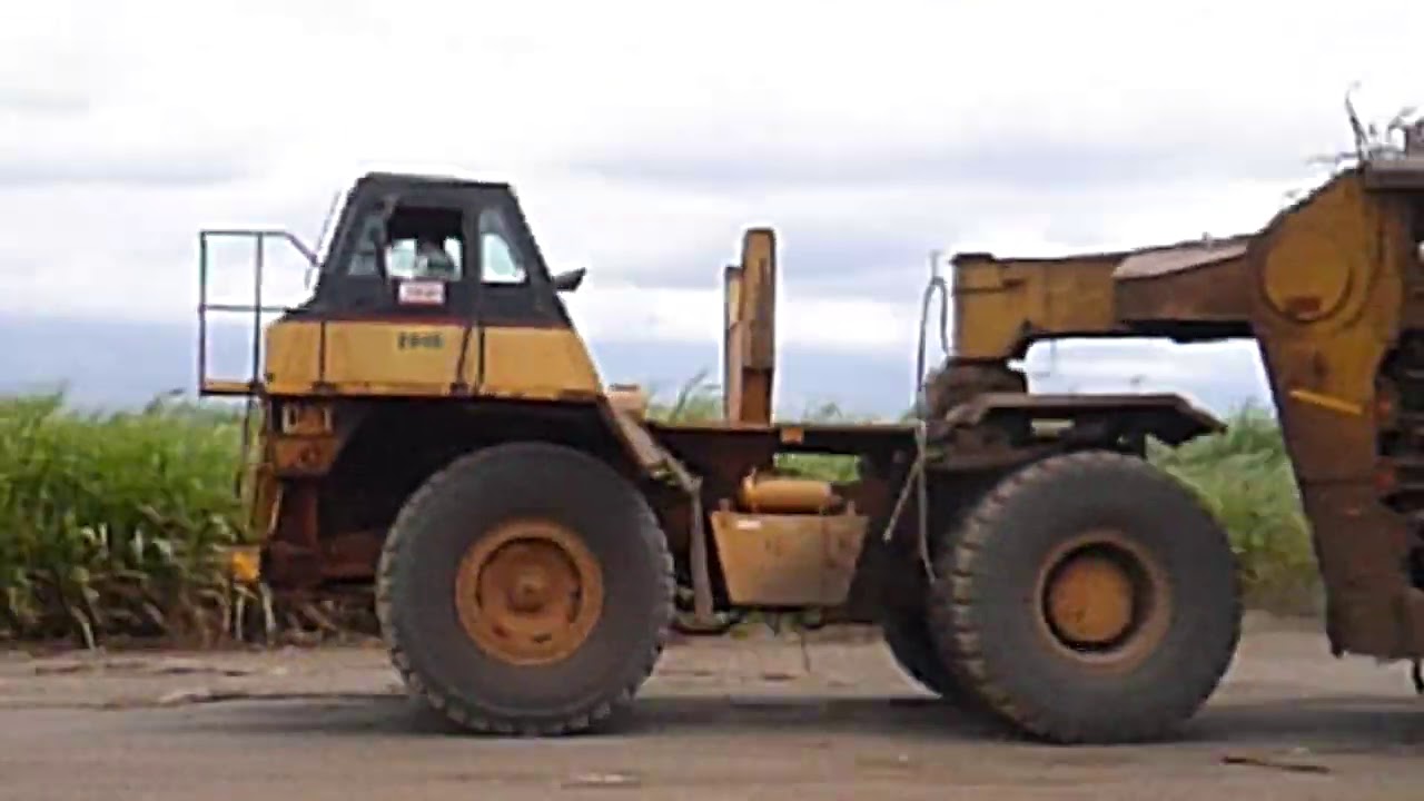 Cane haul truck brings sugar cane to Pu'unene Mill, Maui - YouTube