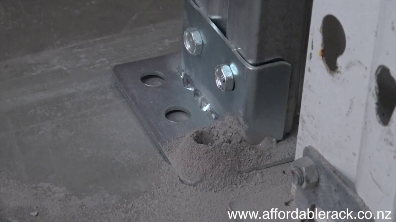 How to dynabolt the pallet racking into the concrete floor - YouTube