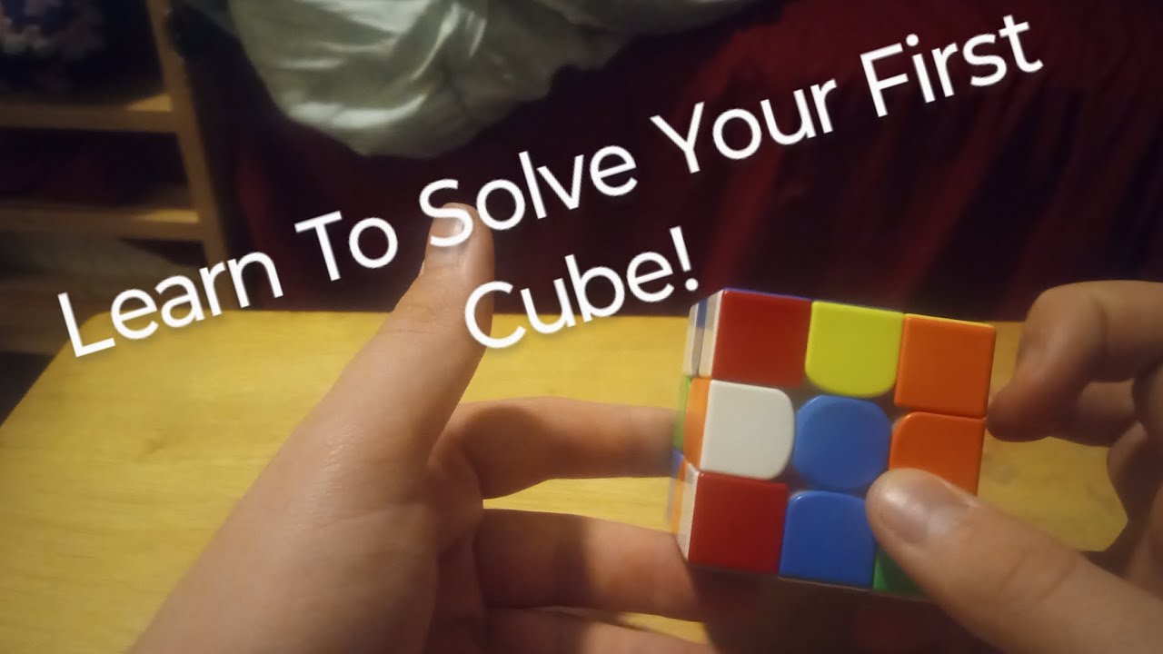 How To Solve a Rubik's Cube - The Easy Way - YouTube