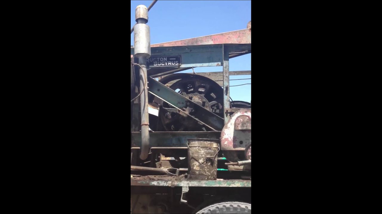 Cable tool rig cleaning borehole - YouTube