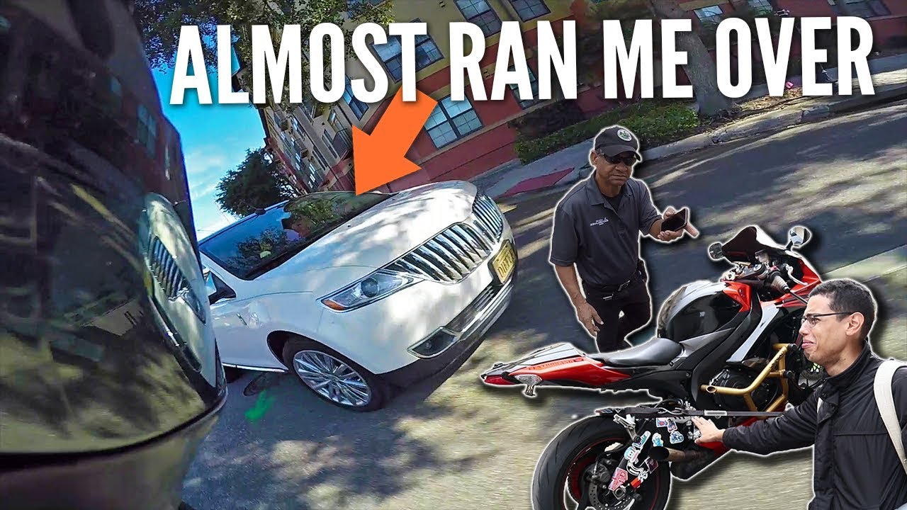 CAR ALMOST RUNS BIKER OVER - RIP MOTORCYCLE - NICE SECURITY GUARD ...