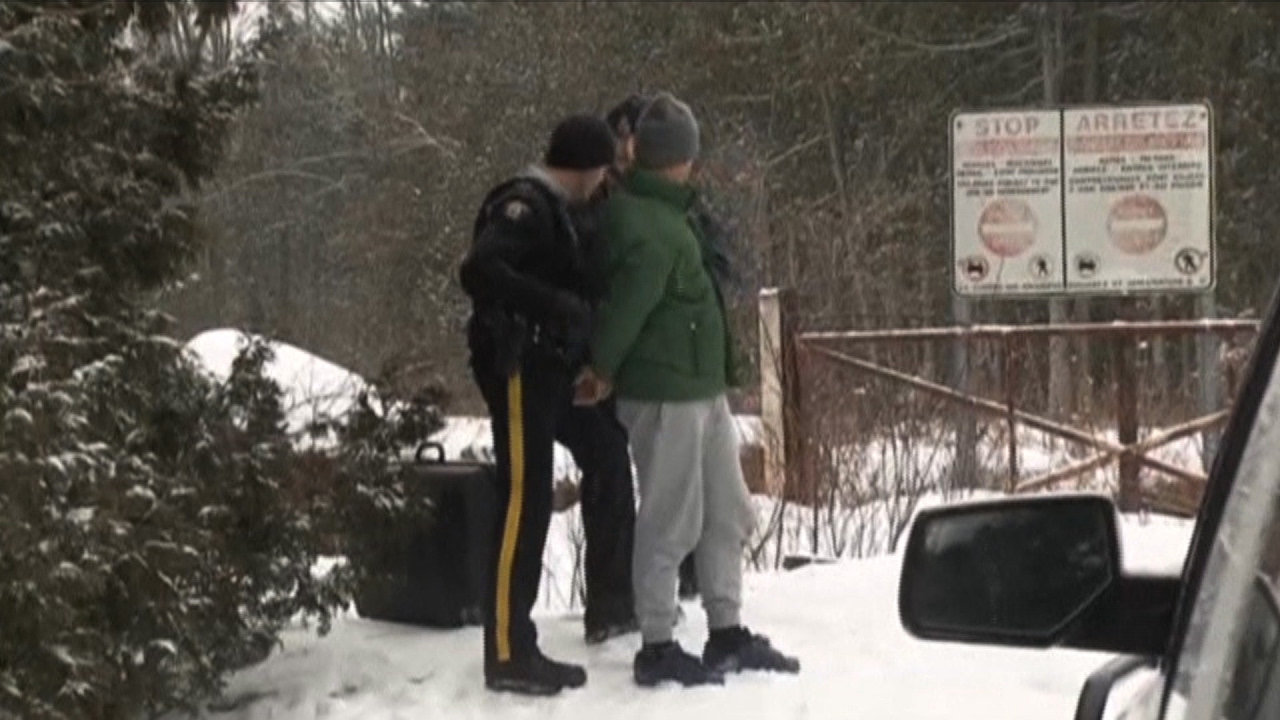 Crossing the Northern Border: Immigrants in U.S. Flee into Canada ...
