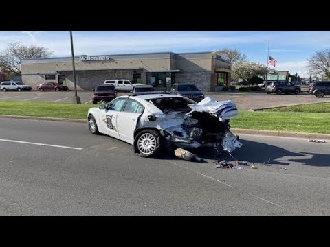 Cop car stolen and crashed by arrest escapee - YouTube
