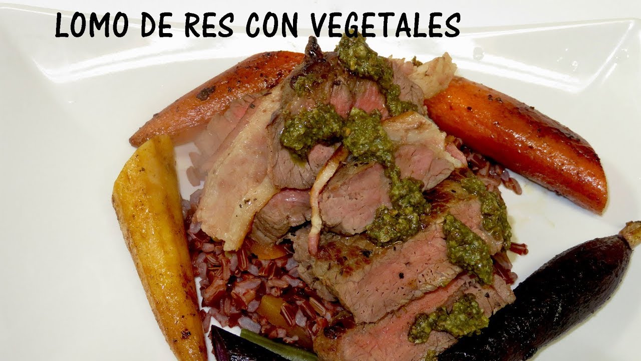 Lomo de res (Solomillo ) envuelto en tocino . Con arroz rojo y ...