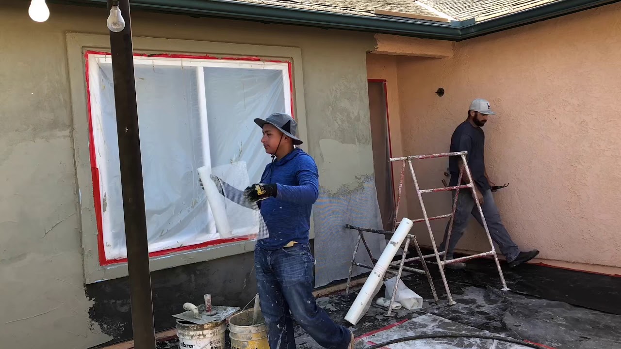Smooth trowel stucco over fiber wrap - YouTube