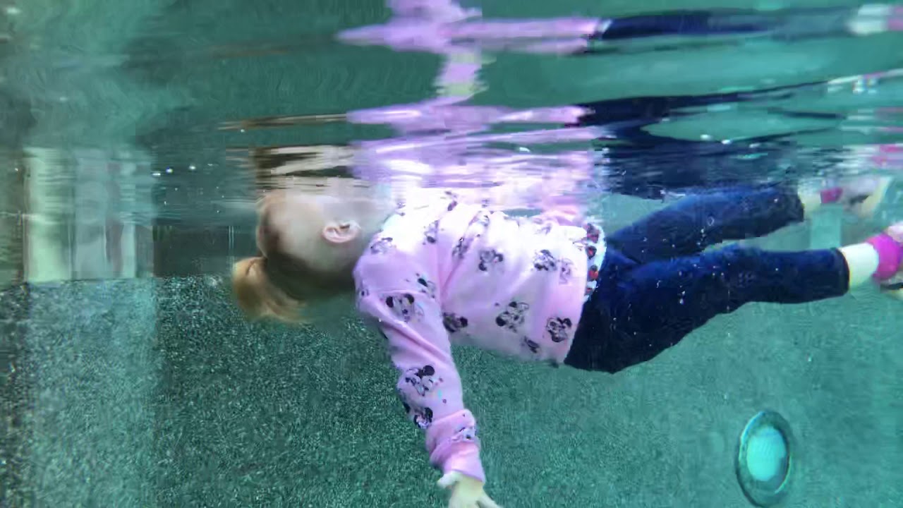 Toddler simulating falling in a pool - YouTube