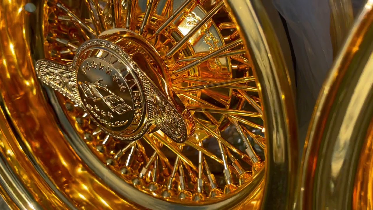 all gold 13x7 with Impala engraved knock offs - YouTube