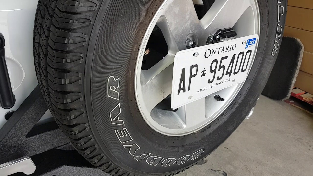 Installation relocate the license plate Jeep wrangler - YouTube