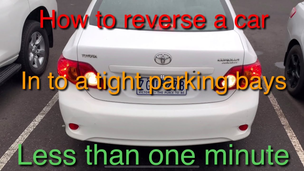How to reverse a car in to a tight parking bays (less than one minute ...