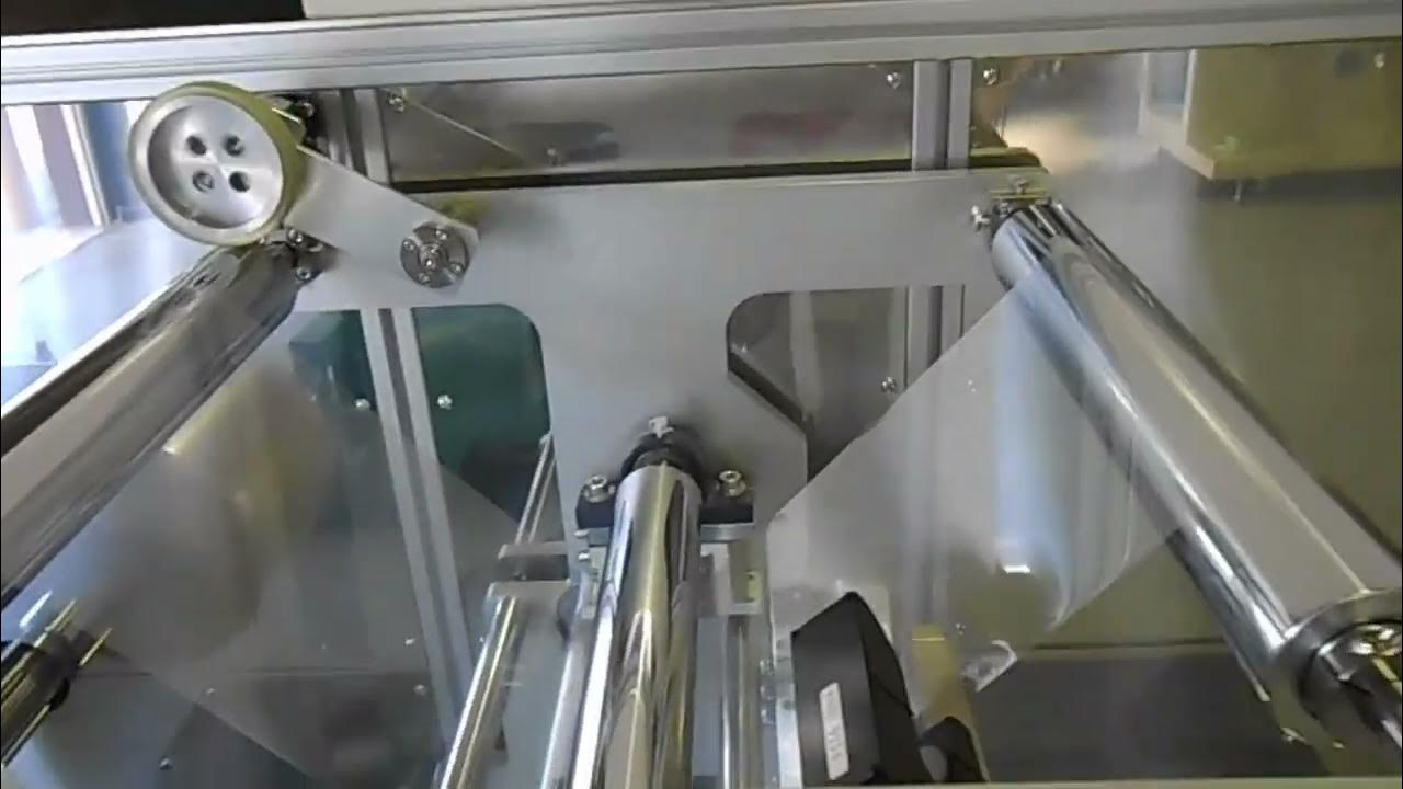 フィルム巻替え装置MSM3-300A-EPC-001-1 - YouTube