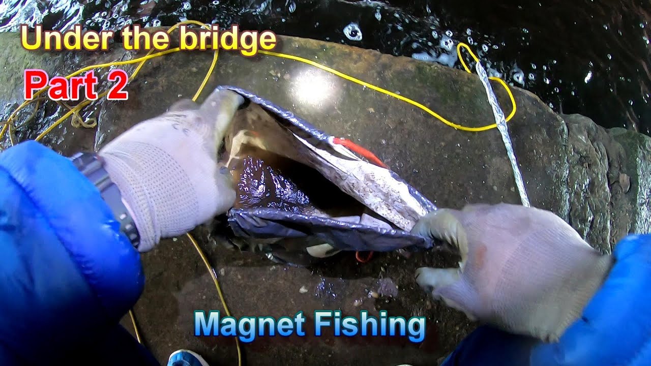Magnet fishing under the bridge Part 2. - YouTube
