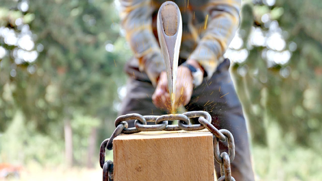 Will An AXE Split A Chain In Half??? - YouTube