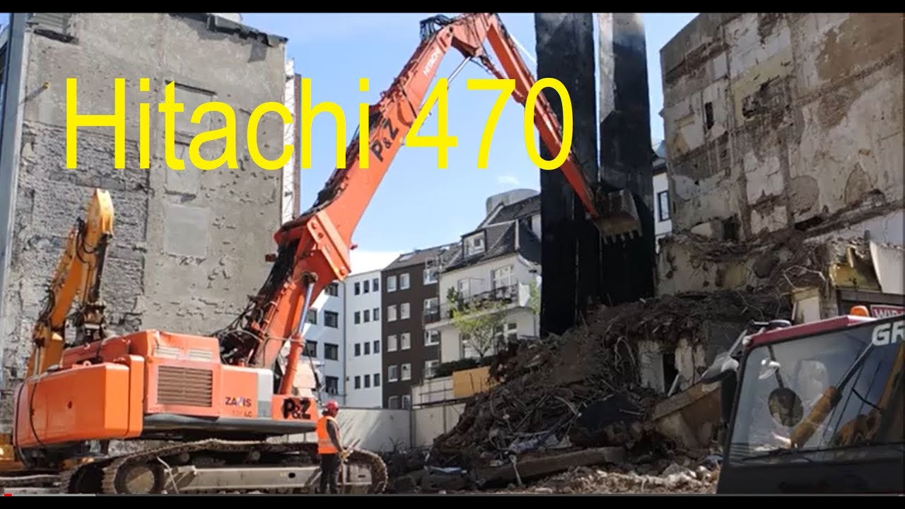 Excavator Hitachi 470 lonfront demolition site - YouTube