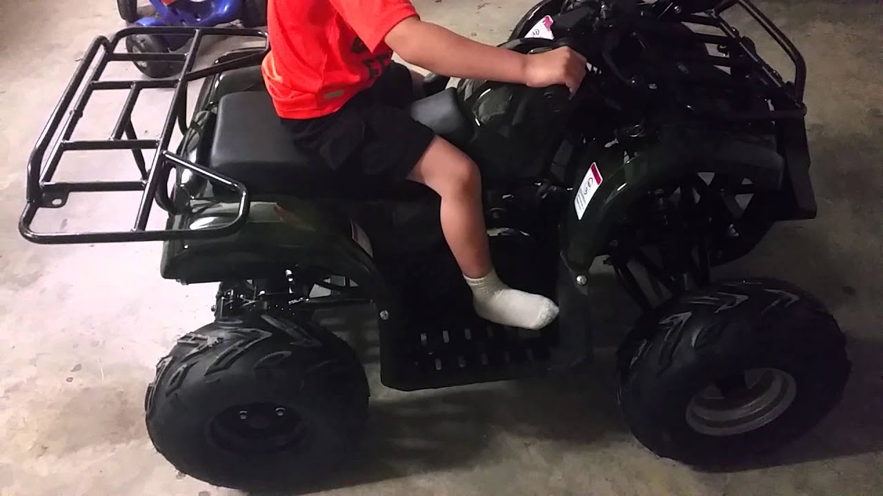 Chaz in four wheeler for first time. - YouTube