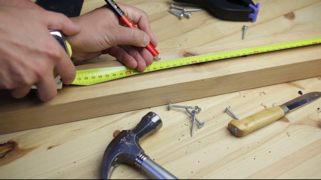 man carpenter measuring wood trim - YouTube