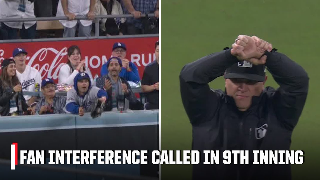 Fan interference ruled as Dodgers fan reaches over the wall for Gleyber ...