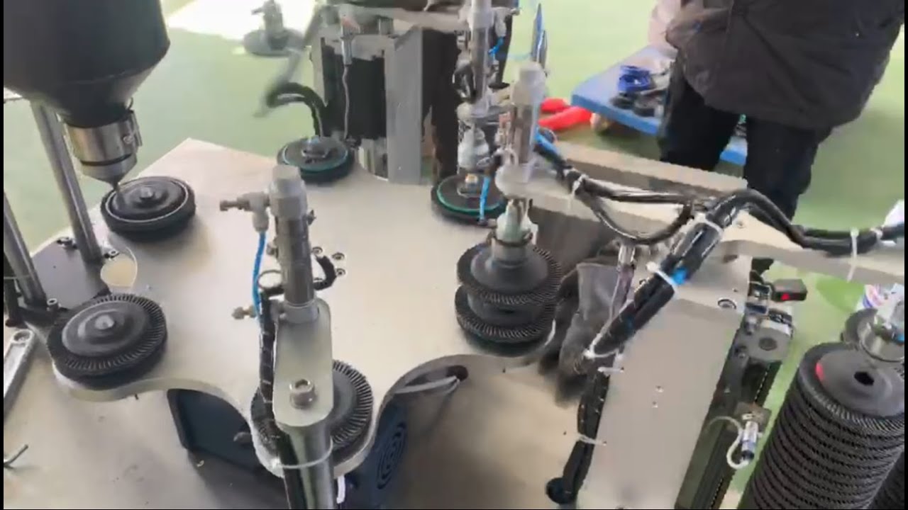Full automatic flap disc back glue machine - YouTube