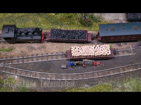 Micro Model Railway and Narrow Gauge Steam Trains in a Stone Quarry in ...