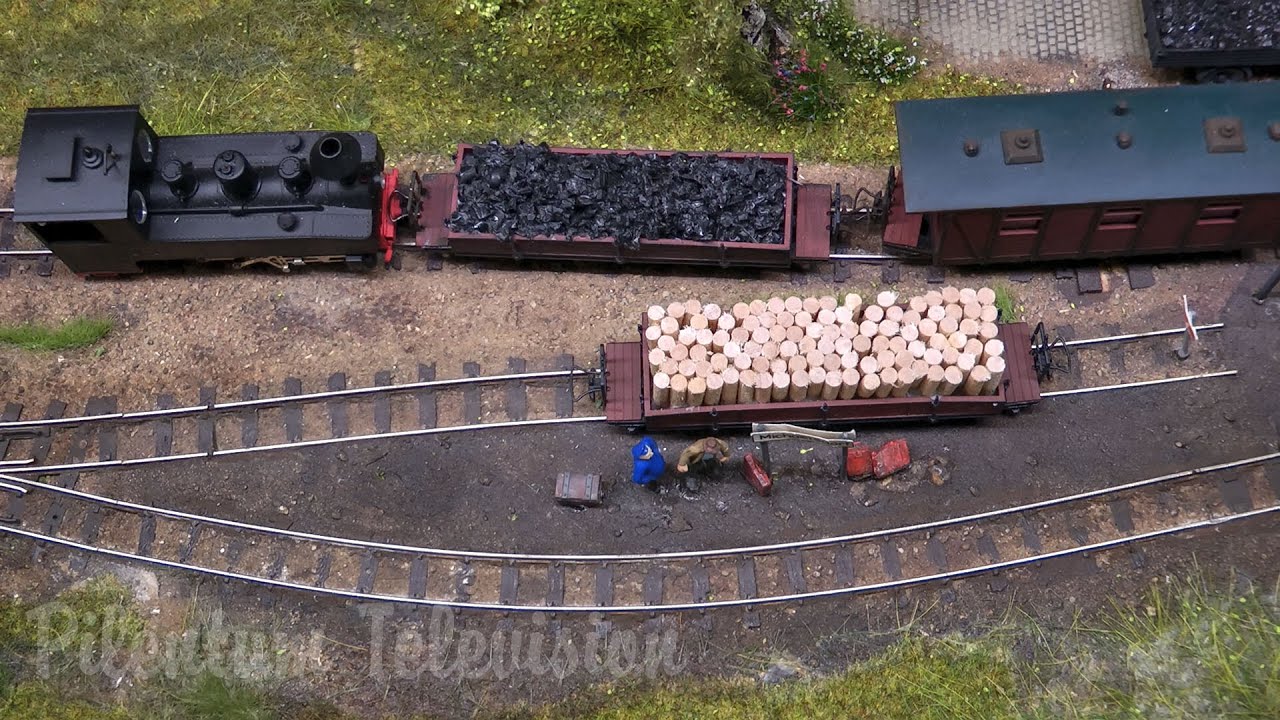 Micro Model Railway and Narrow Gauge Steam Trains in a Stone Quarry in ...