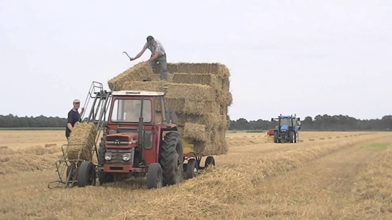 Baling and loading small straw bales - YouTube