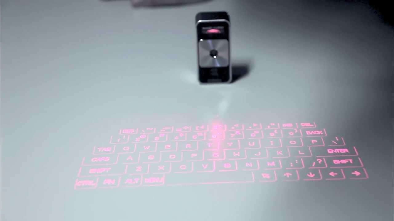 Celluon Magic Cube iPad Lasertastatur (für alle iPad, iPhone und iPod ...