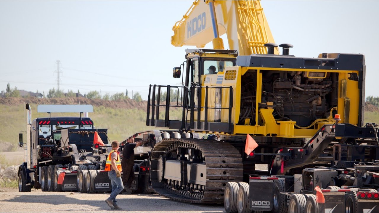 Another Komatsu 1250 on the move - YouTube