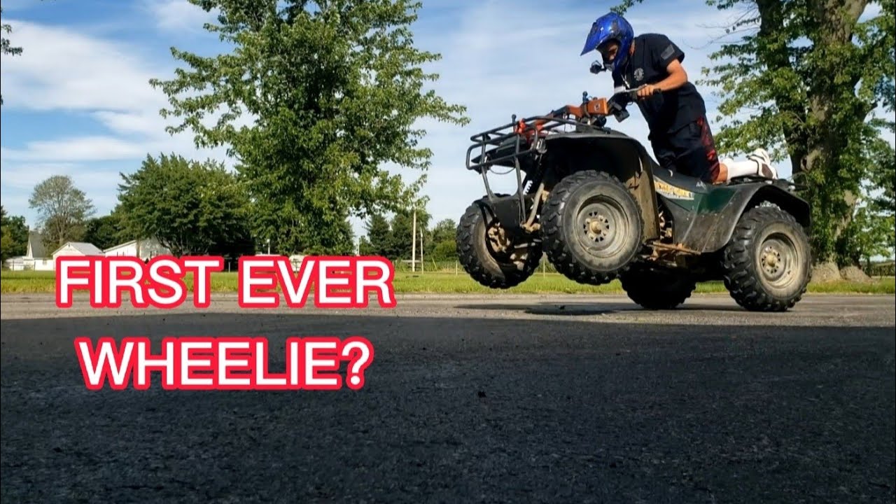 Wheelieing on the new Fourwheeler?! - YouTube