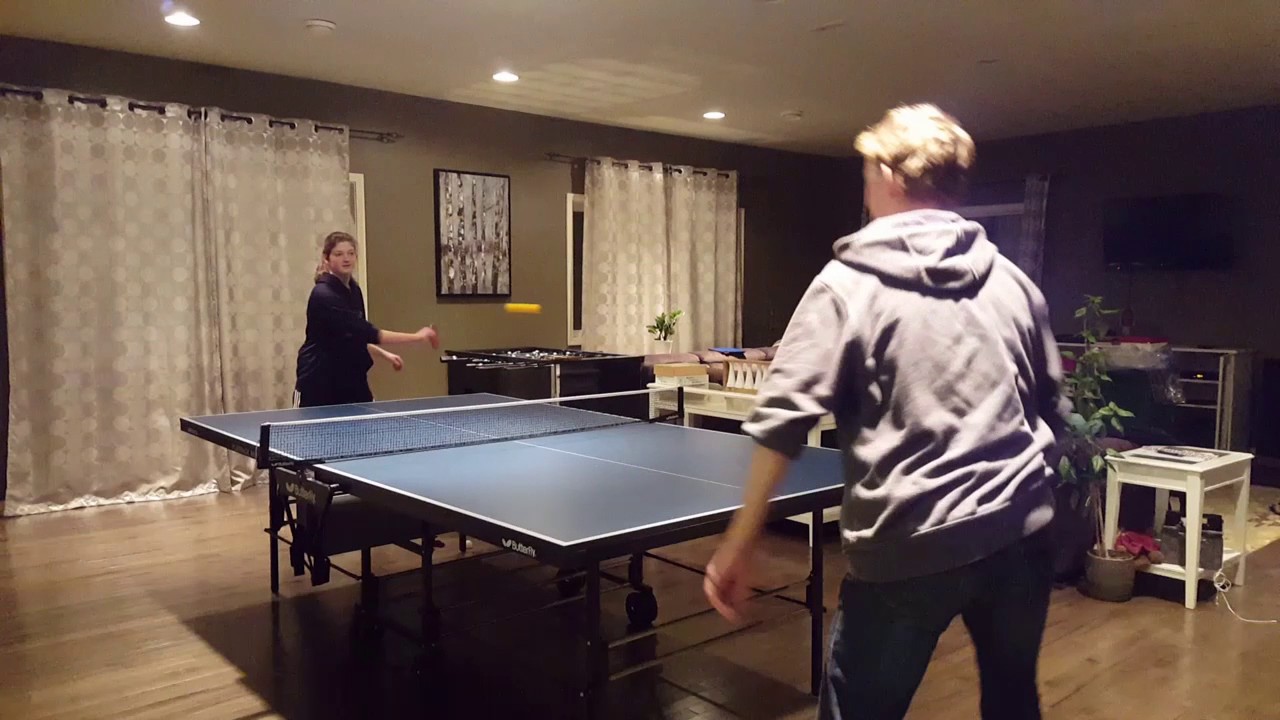 Jana and Nolan playing ping pong - YouTube