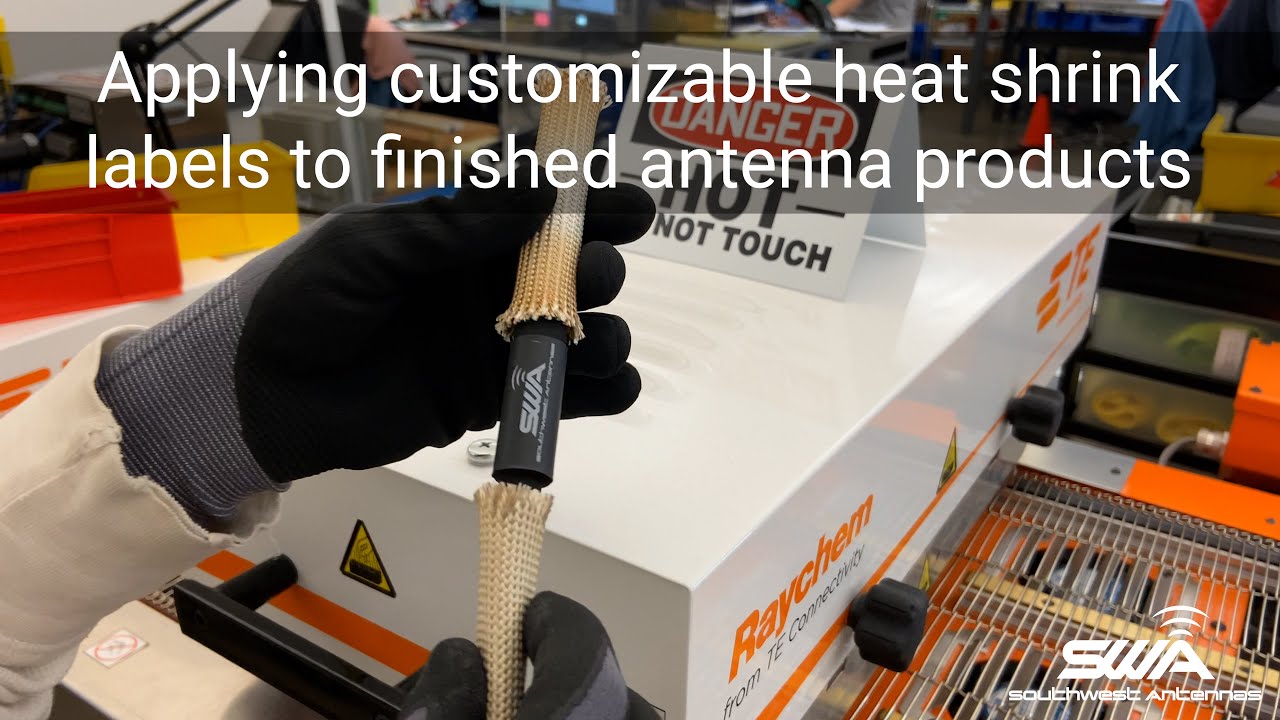 Applying customizable heat shrink labels to finished antenna products ...