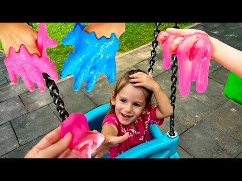 Eva parkta sürpriz yumurtaları buluyor ve Slime yapma oyunu oynuyor - Çocuk parkı videoları