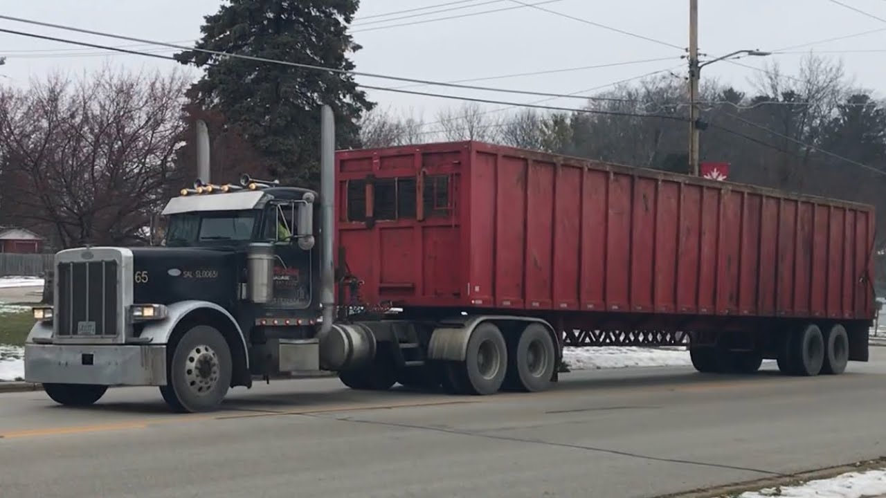 Trucks around town featuring a Peterbilt Jake Brake - YouTube