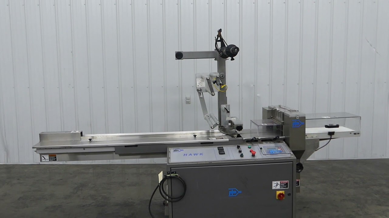PFM Hawk Print Registered Flow Wrapper Machine. - YouTube