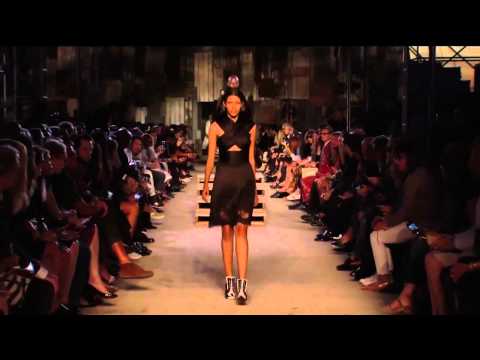 Models Candice Swanepoel & Pooja Mor fall down during Givenchy Spring/Summer 2016 fashion show