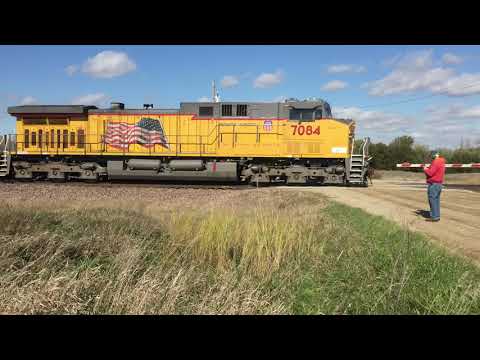 Light power move: two GE locomotives V Avenue in Boone County