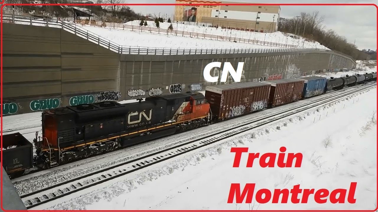 2 12 23 LONG WESTBOUND CN TRAIN SEEN FROM MONTREAL OVERPASS - YouTube