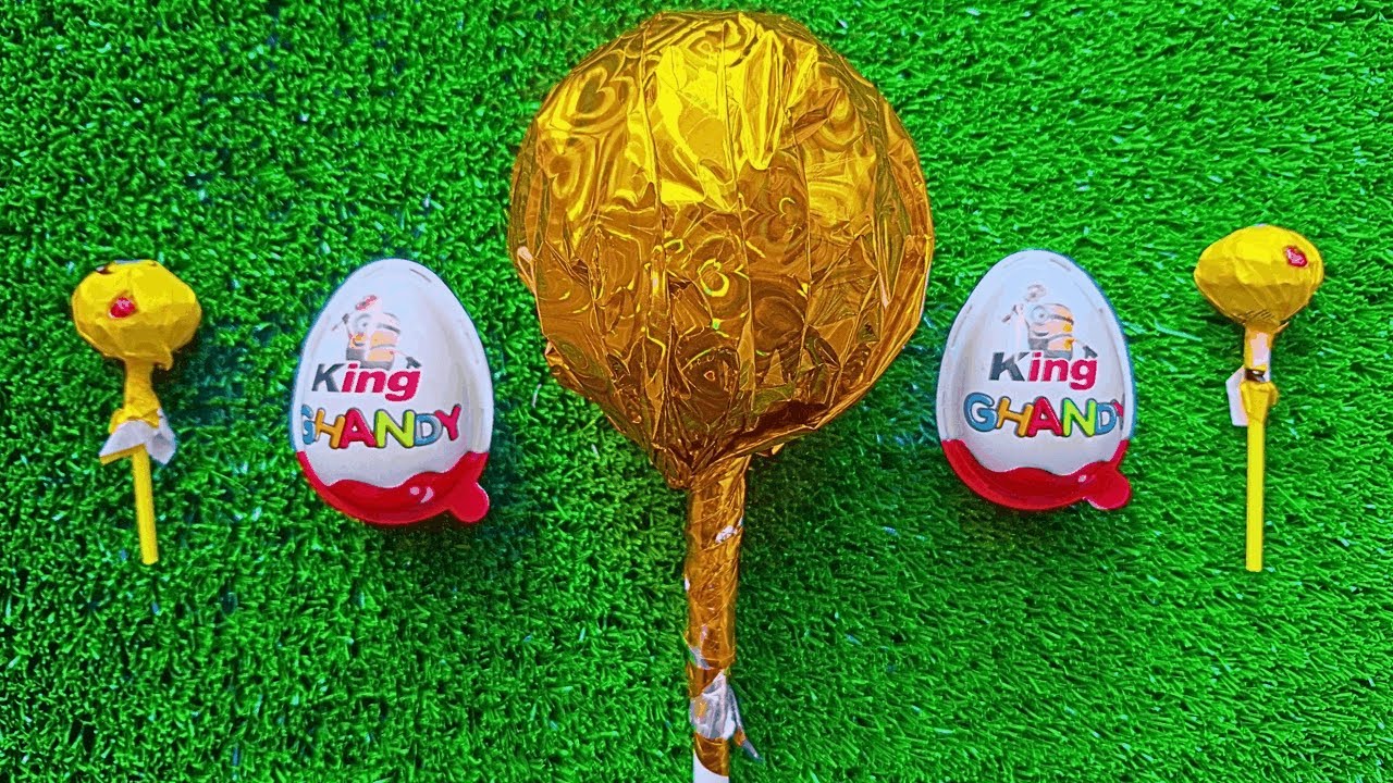 Satisfying Video Unpacking Giant golden lollipop with Color Candy and ...