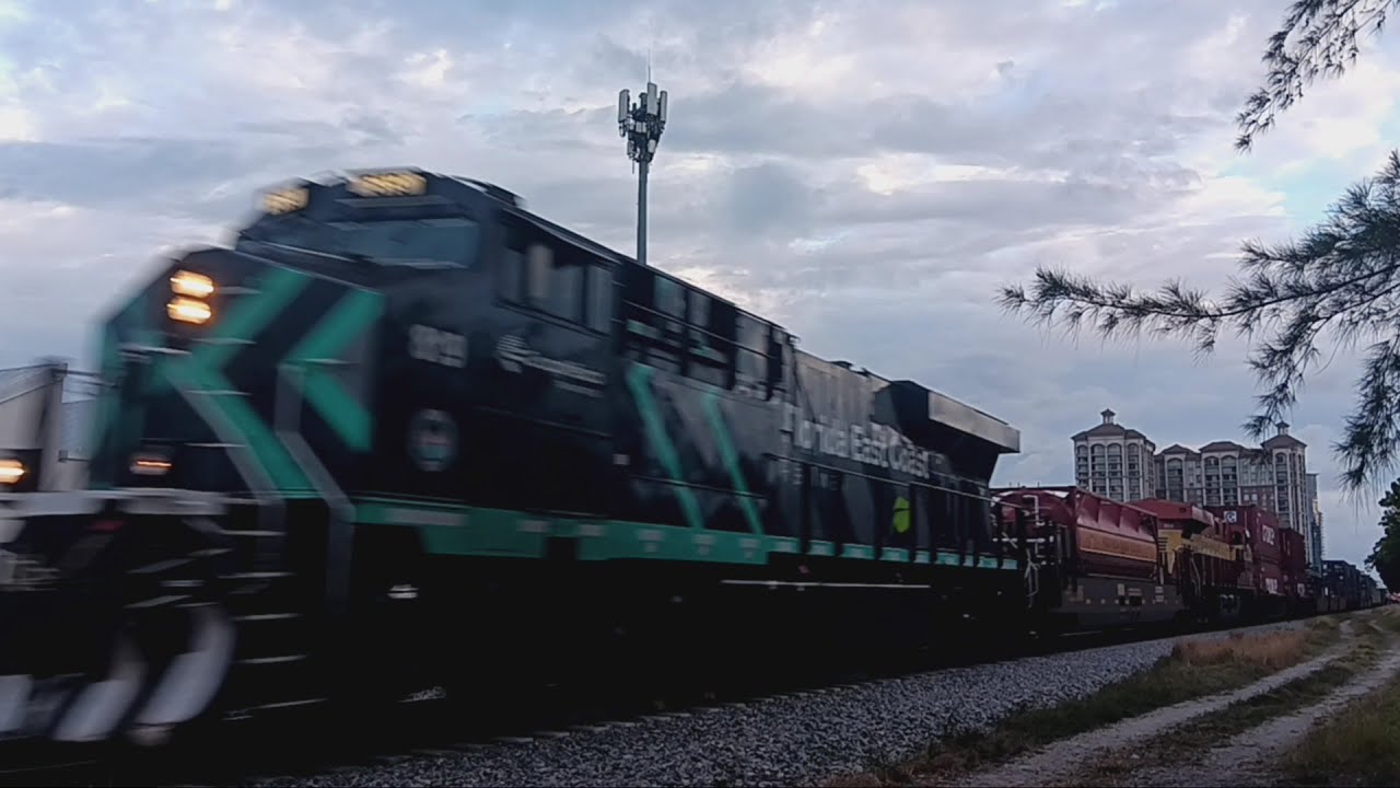 FEC 109-27 and a Southbound Brightline - YouTube