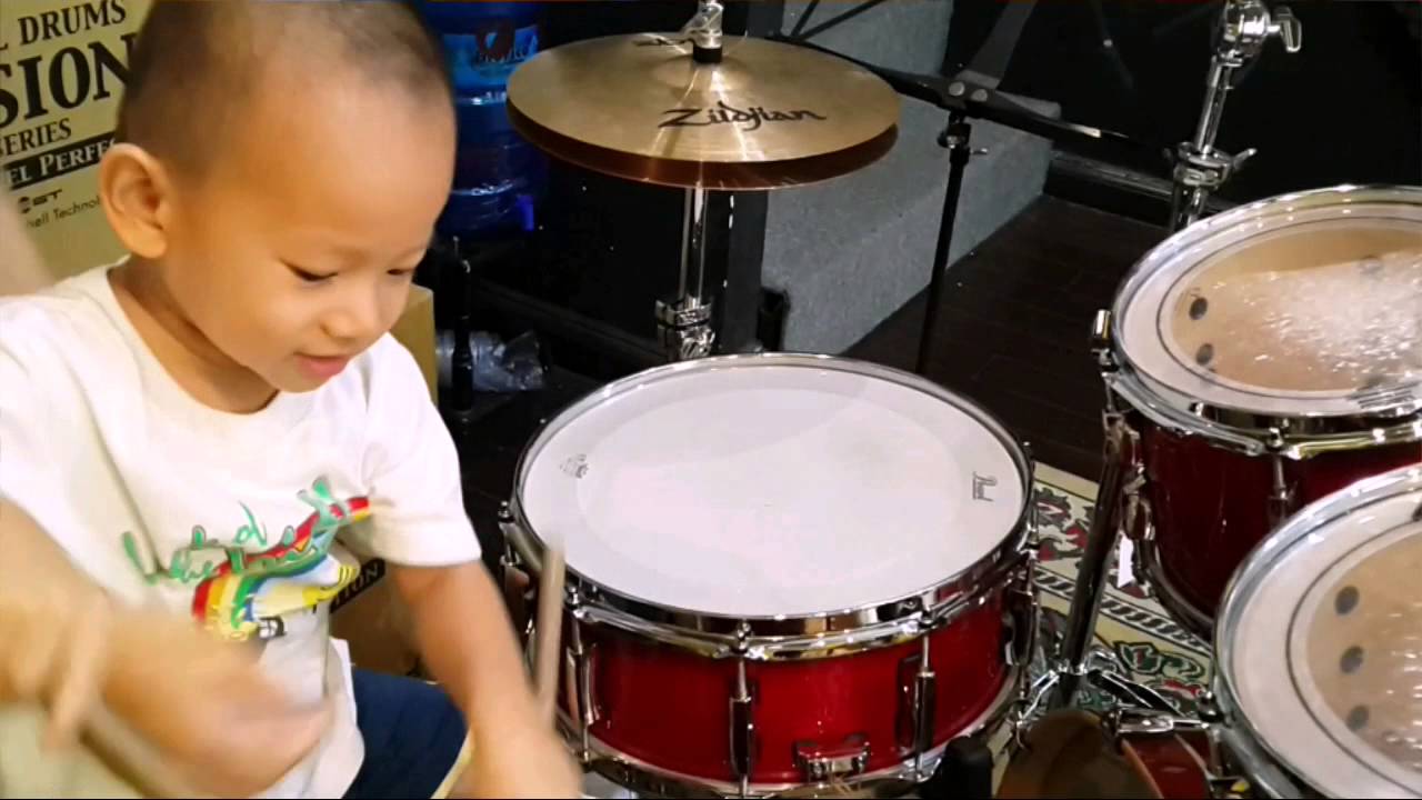 Simba playing the drums for the first time - YouTube