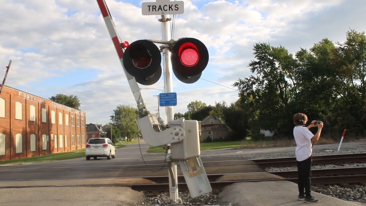 CSX Mixed Fright Train at Poplar Street Railroad Crossing in Fostoria ...
