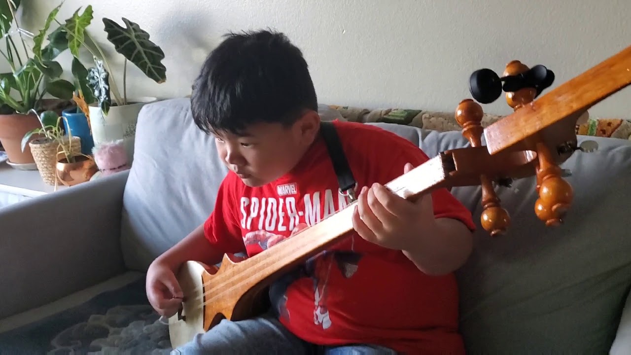 Kids practicing Tibetan National Anthem on Tibetan Dramyen (Lute ...