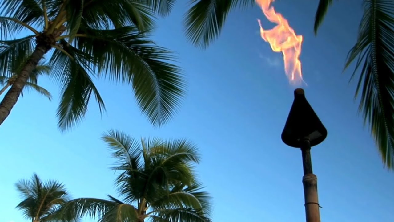 Tiki Torch Flames in Waikiki beach, Honolulu Hawaii in slow motion in ...